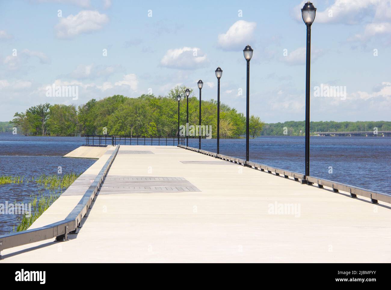 Concrete pier on a lake Stock Photo - Alamy