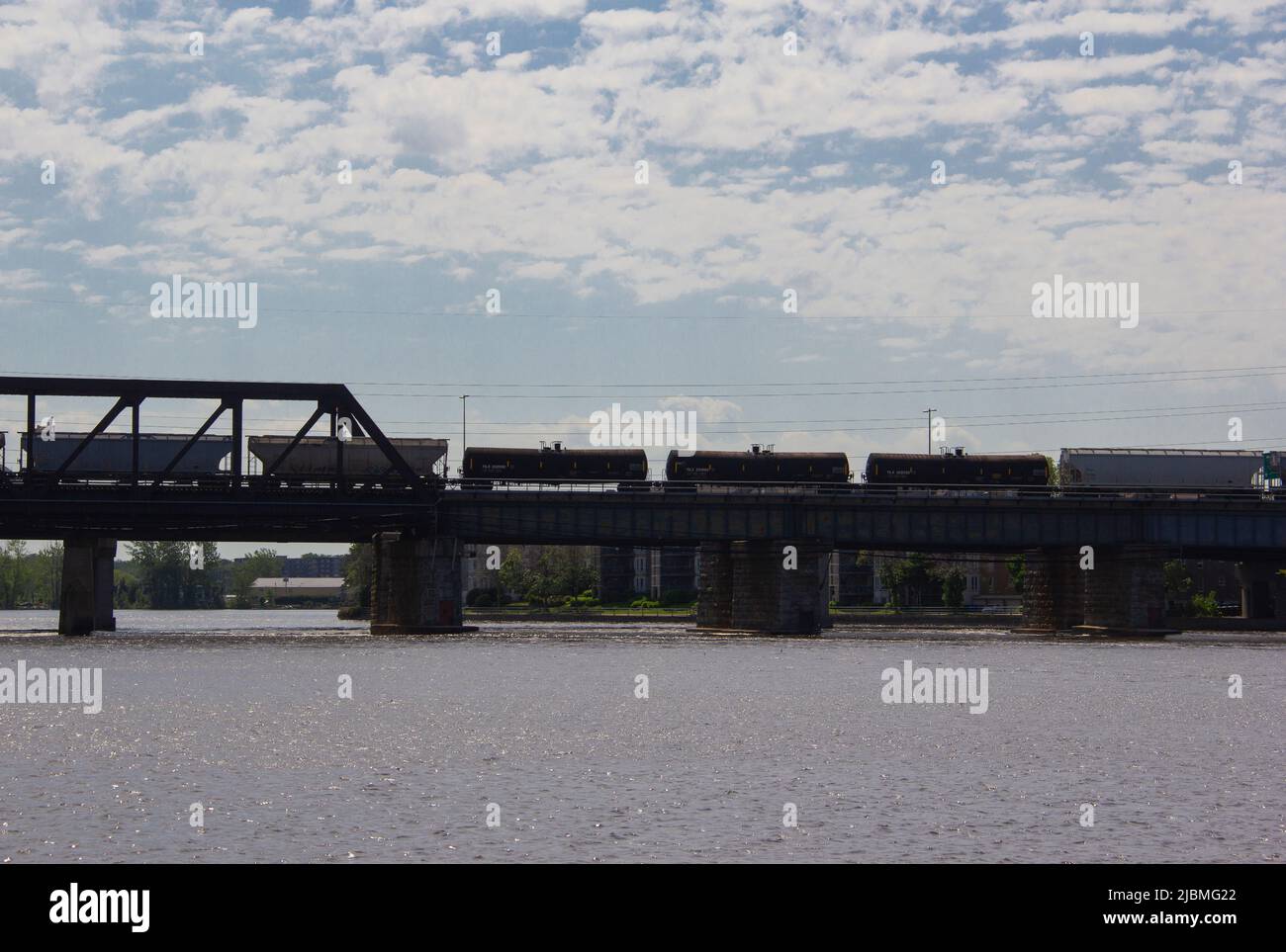 Freight train on a rail bridge Stock Photo - Alamy