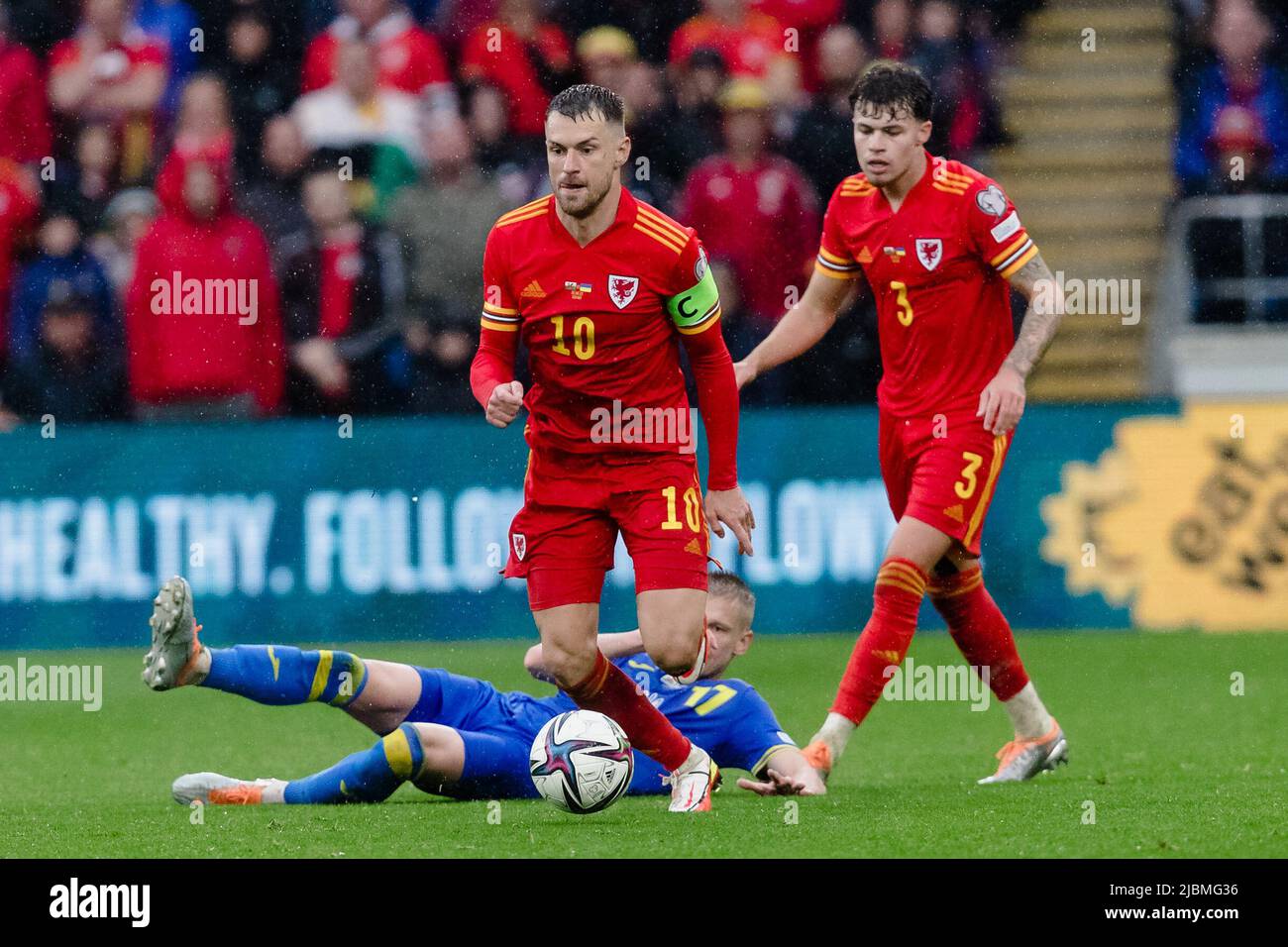 CARDIFF, WALES - 05 JUNE 2022:Wales' Aaron Ramsey, Wales' Neco Williams ...