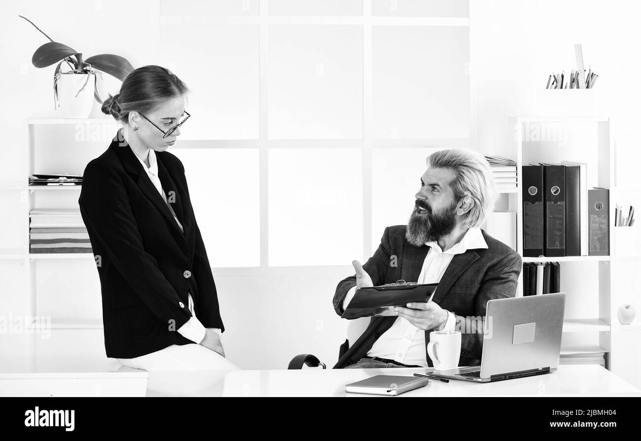 Business couple working. Couple in office. Distribute obligations and ...