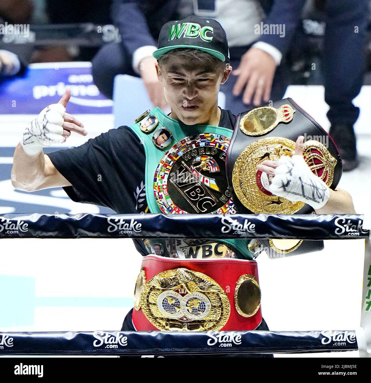 Japanese boxer Naoya Inoue celebrates after his second-round technical ...