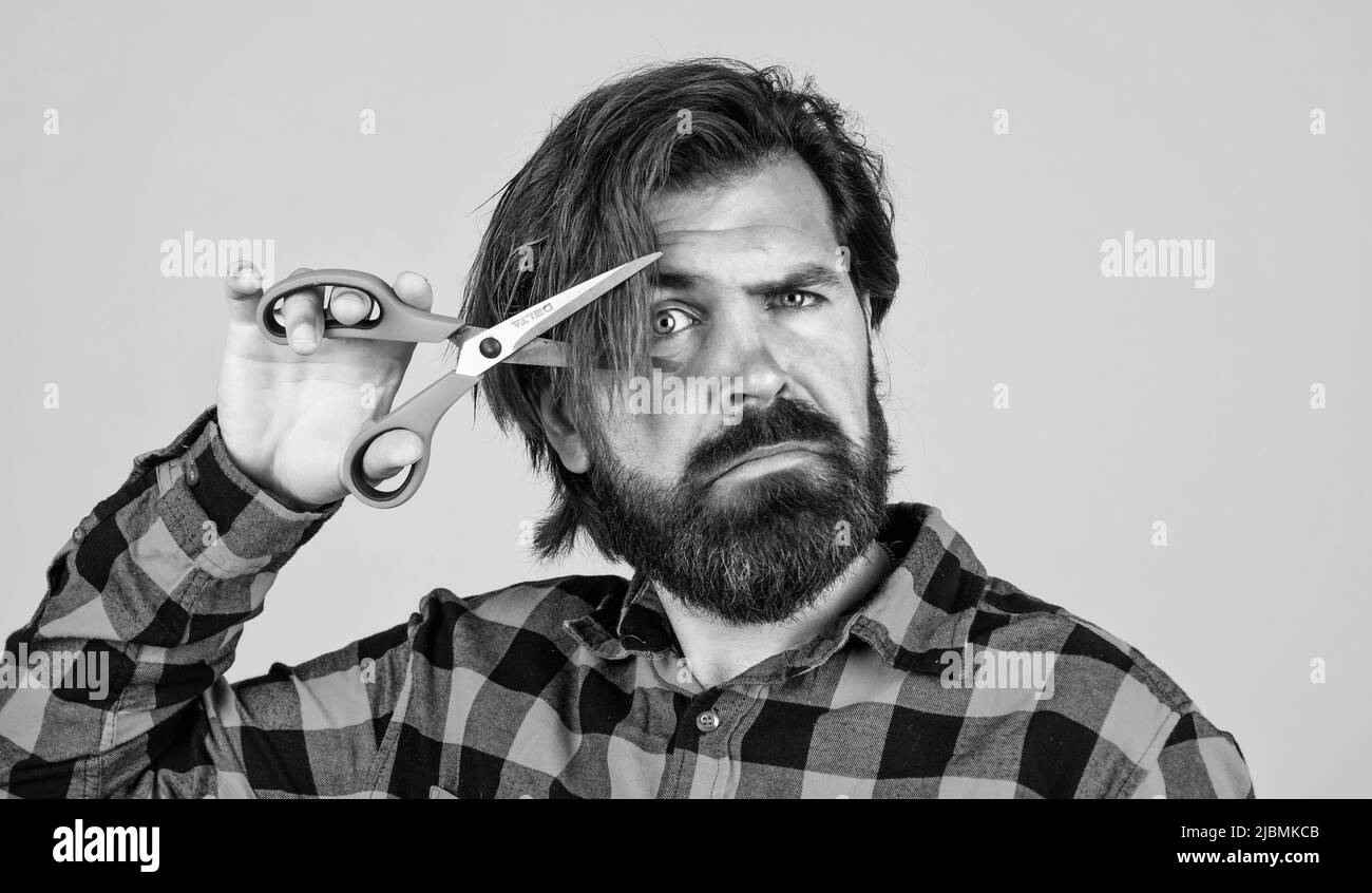 Barber haircut hair using scissors Black and White Stock Photos ...