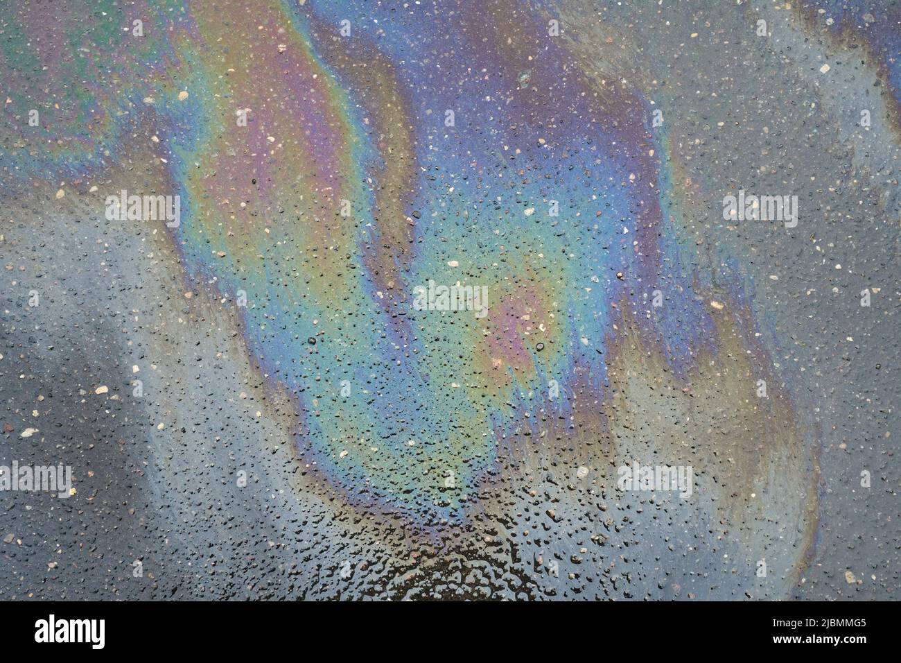 Texture of asphalt and rainbow stains Stock Photo - Alamy