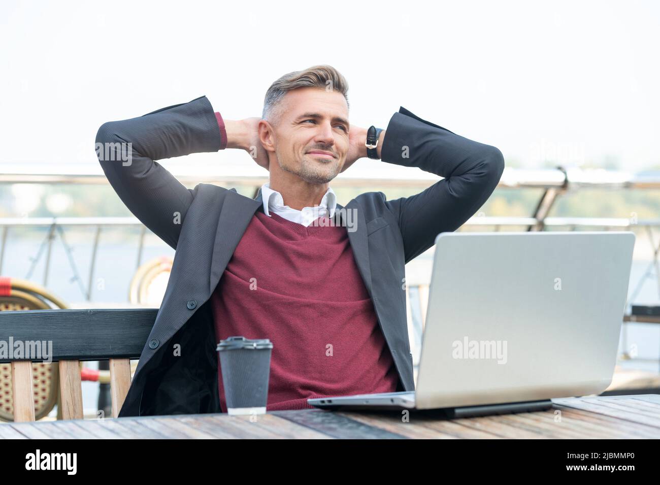 Happy ceo man resting from work during coffee break with laptop in ...