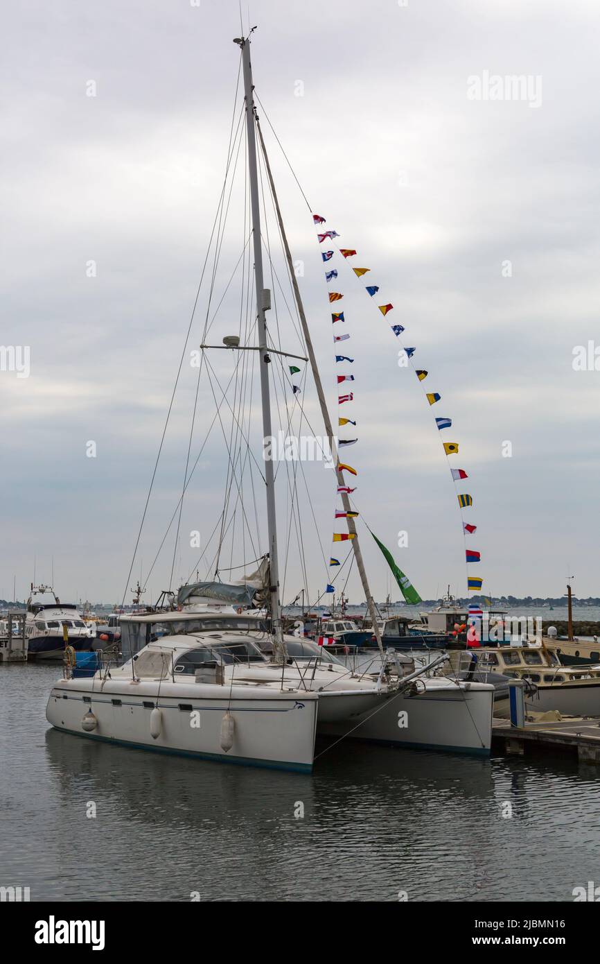 Catamaran boat berthed in marina at Poole Harbour, Poole, Dorset UK in ...