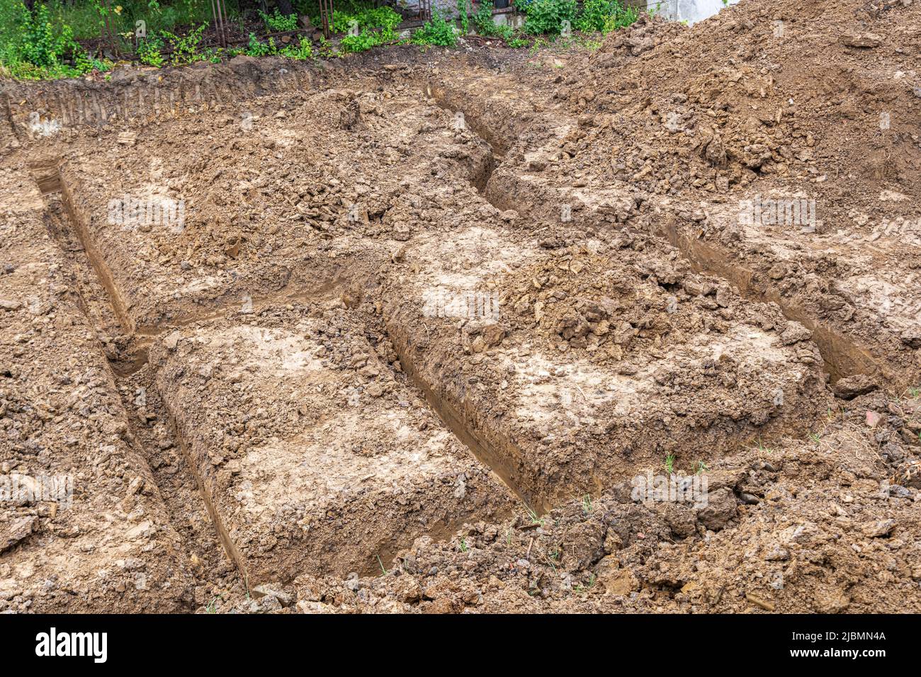 Ground dug for foundation Stock Photo - Alamy