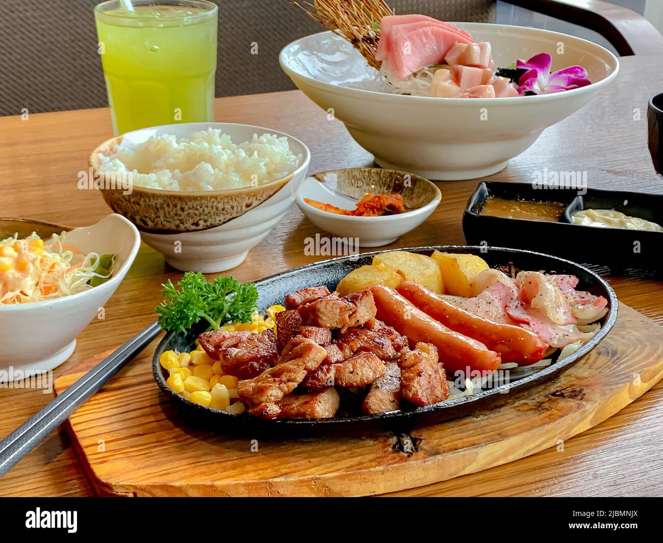 Various menus, sushi, sashimi, nigiri, pan fried pork and miso soup ...