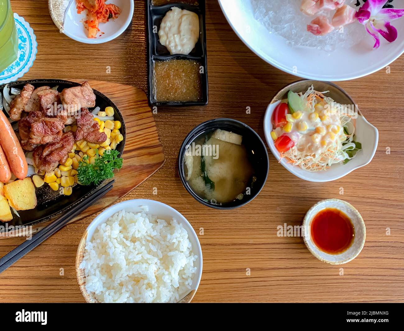 Various menus, sushi, sashimi, nigiri, pan fried pork and miso soup ...