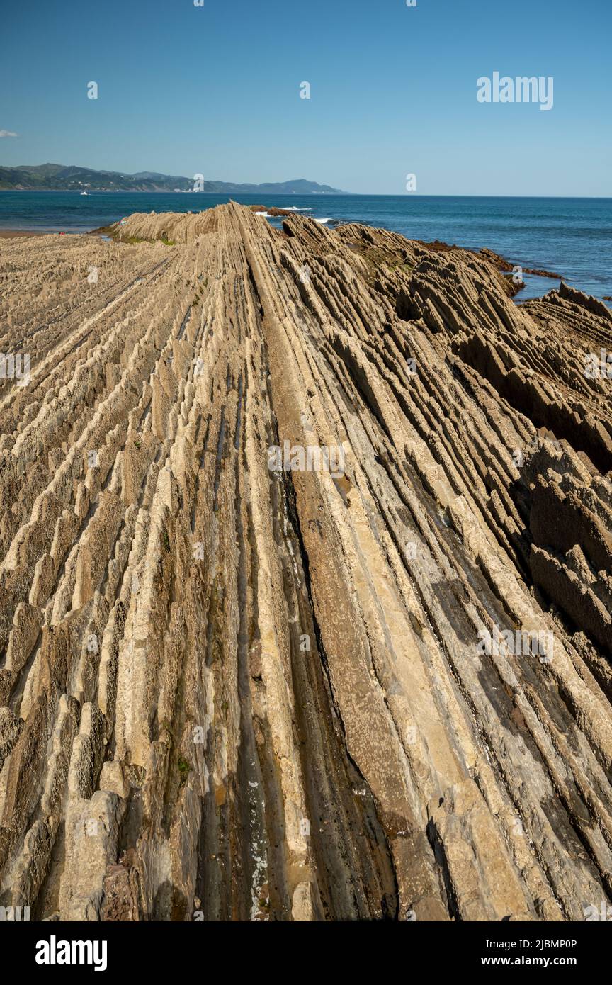 View on steeply-tilted layers of flysch geological formation on ...
