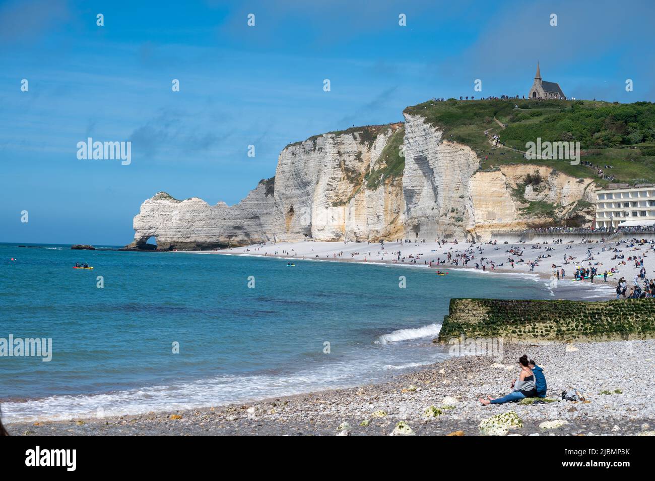 Low tide period and view on white stones on ocean bottom and chalk ...