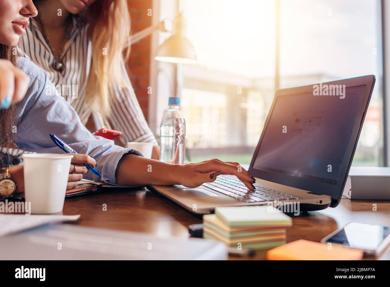 Female hands typing on laptop keyboard. Office work concept Stock Photo ...