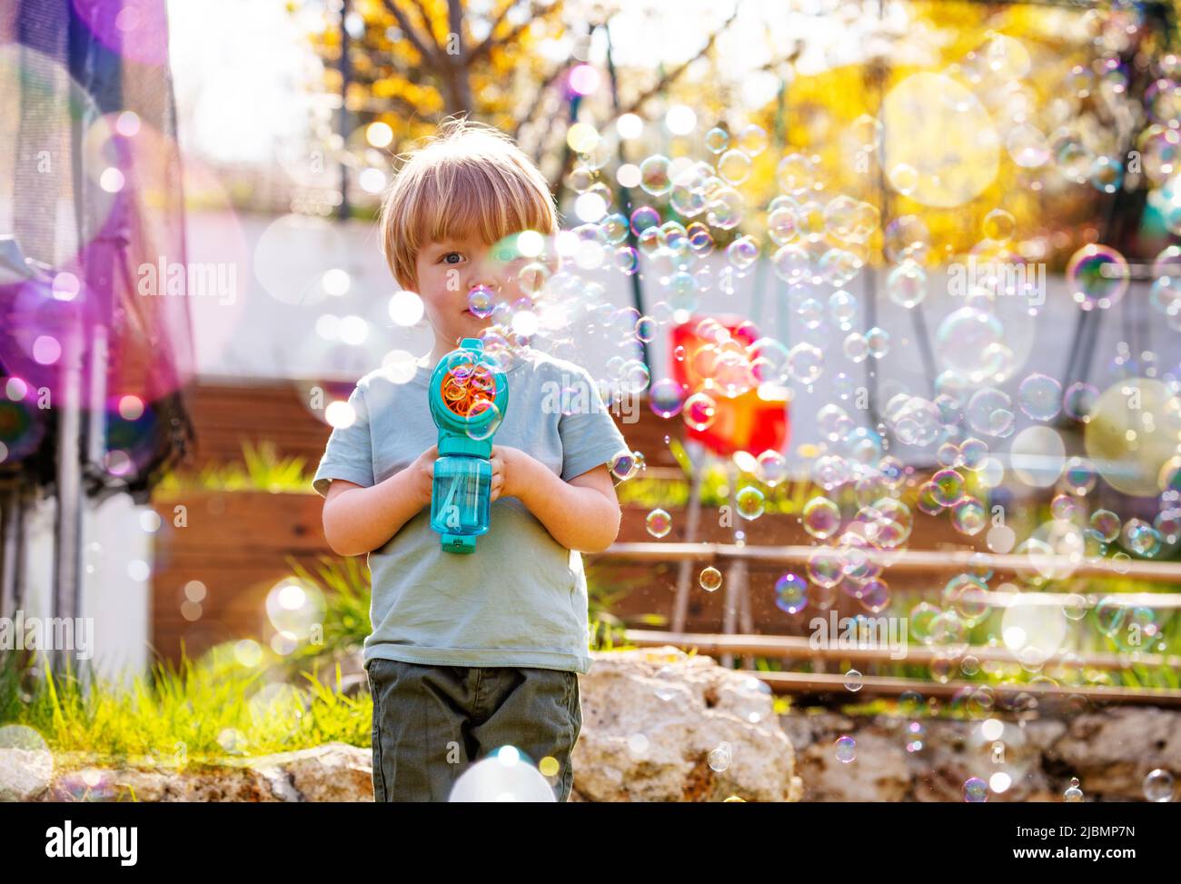 Bubble gun child hi-res stock photography and images - Alamy