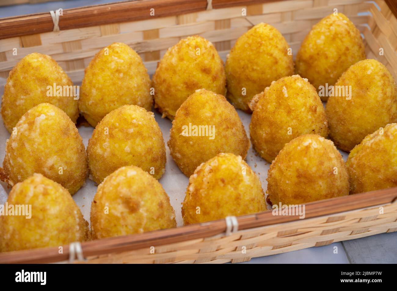Sicilian street food, deep fried rice croquettes with different ...