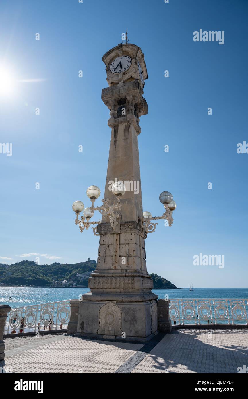 Walking near La Concha white sandy beach in San Sebastian or Donostia ...