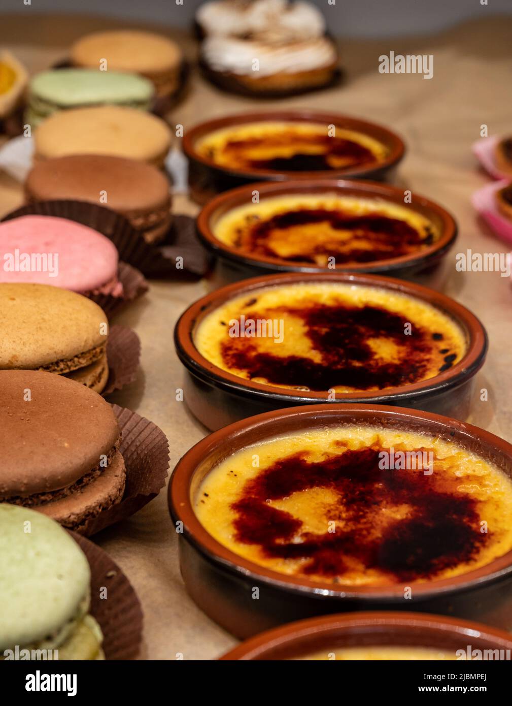 French bakery in morning, fresh baked sweet cream brule dessert on ...