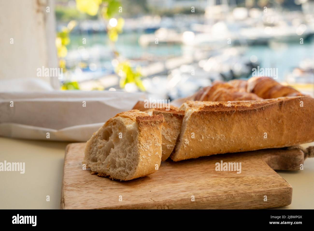 Summer morning in Provence, traditional breakfast with fresh baked ...
