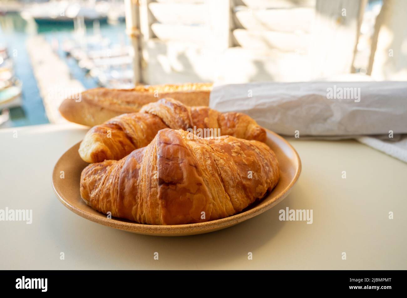 Summer morning in Provence, traditional breakfast with fresh baked ...
