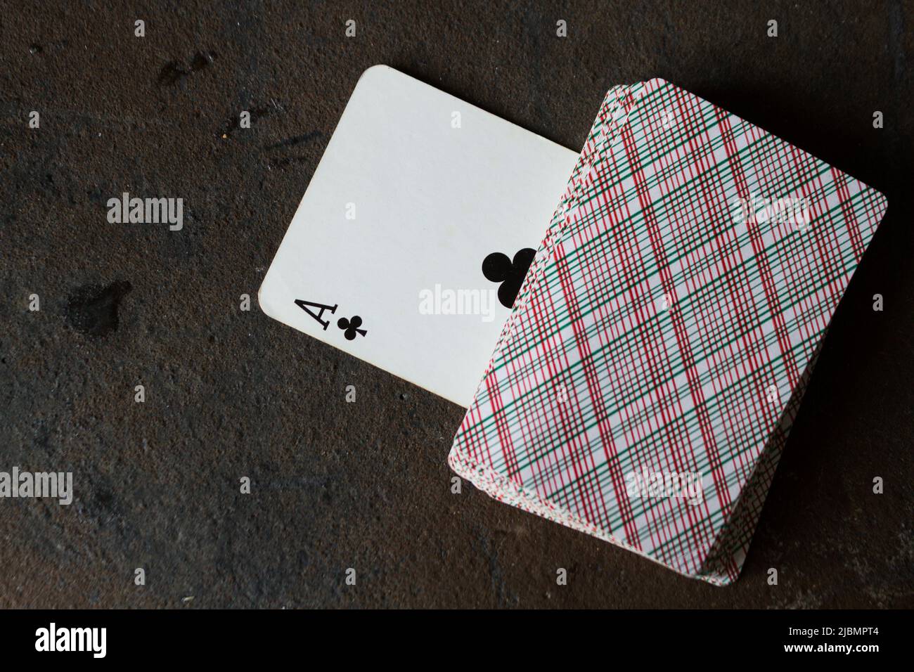 Stack of playing cards on black background Stock Photo - Alamy