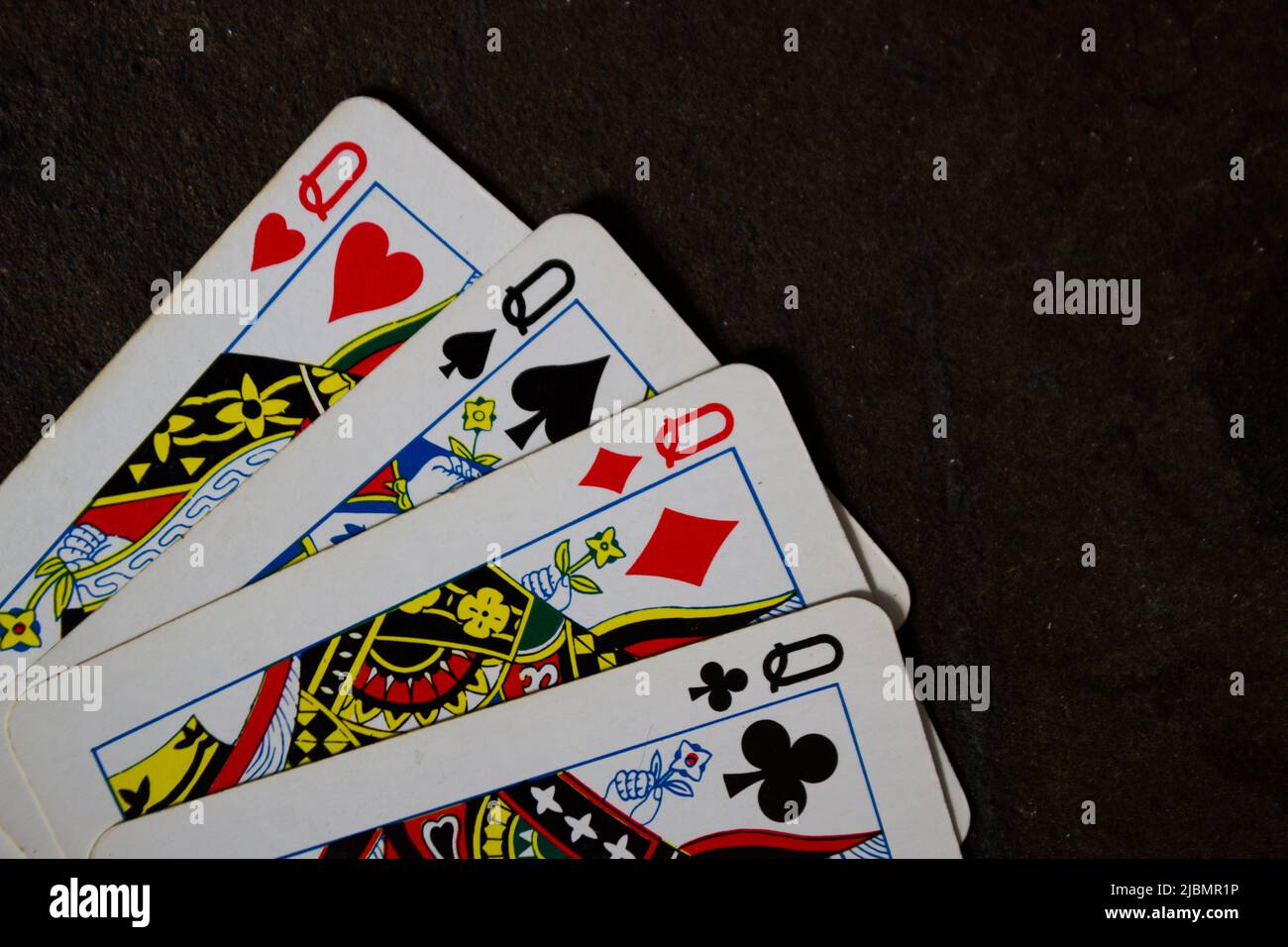 Cards queens four poker hi-res stock photography and images - Alamy