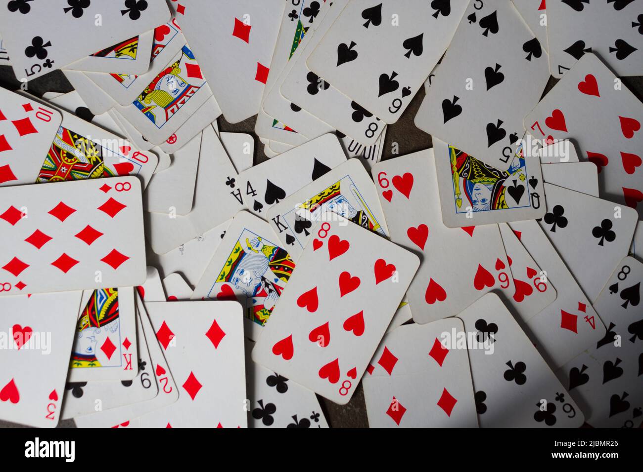 Background of playing cards on the table Stock Photo - Alamy