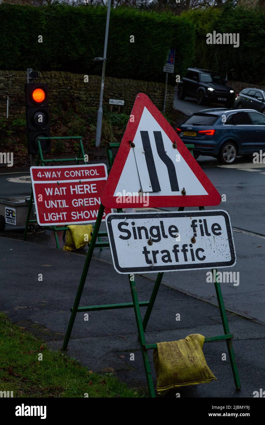 Road sign weighed down with sandbag hi-res stock photography and images ...