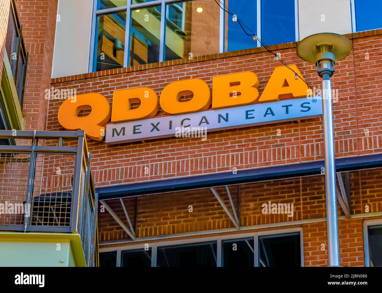 Qdoba Mexican Eats restaurant's exterior facade brand and logo signage ...