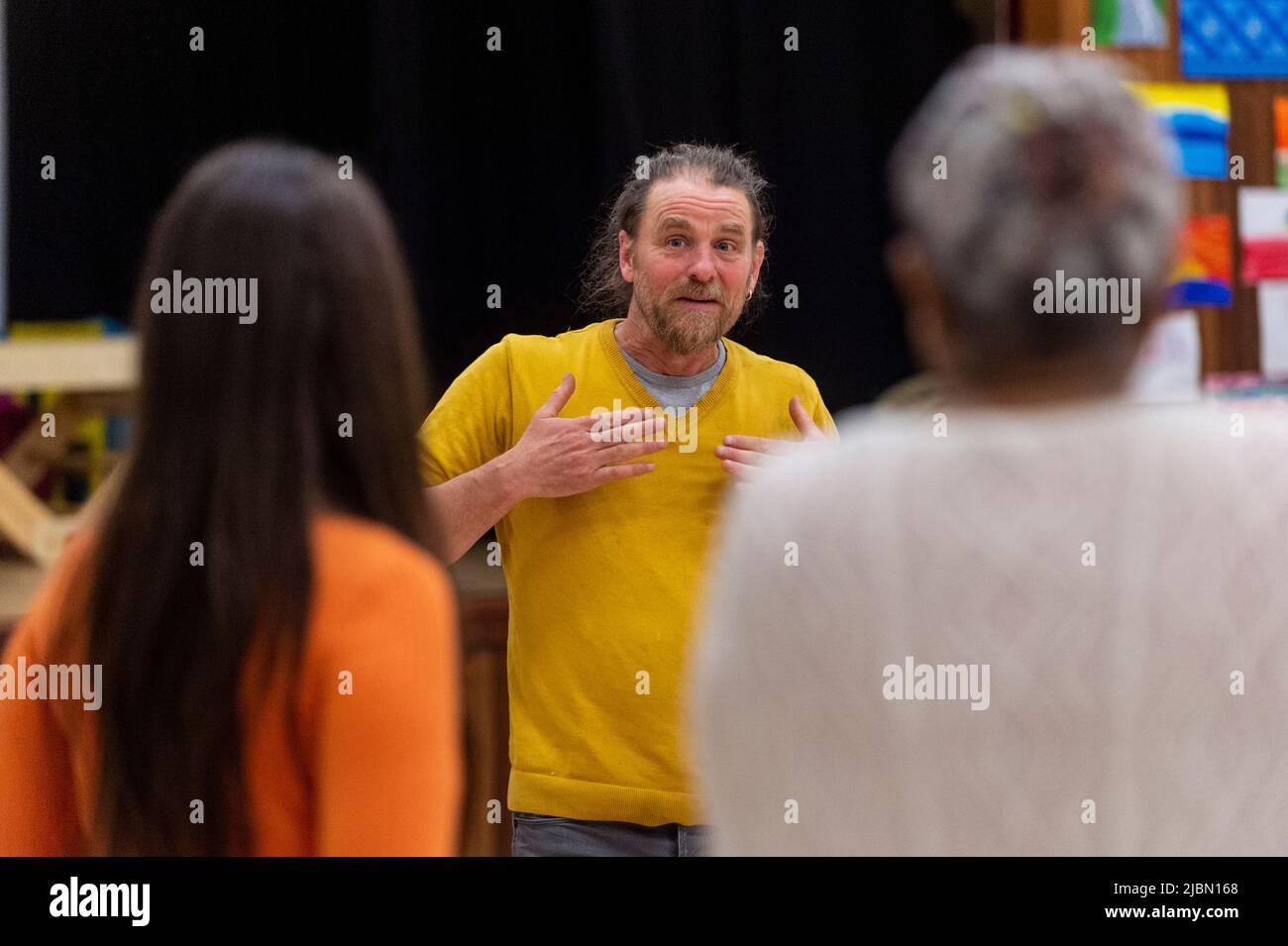 London, UK. 7 June 2022. Music leader Algy Behrens (C) instructs ...