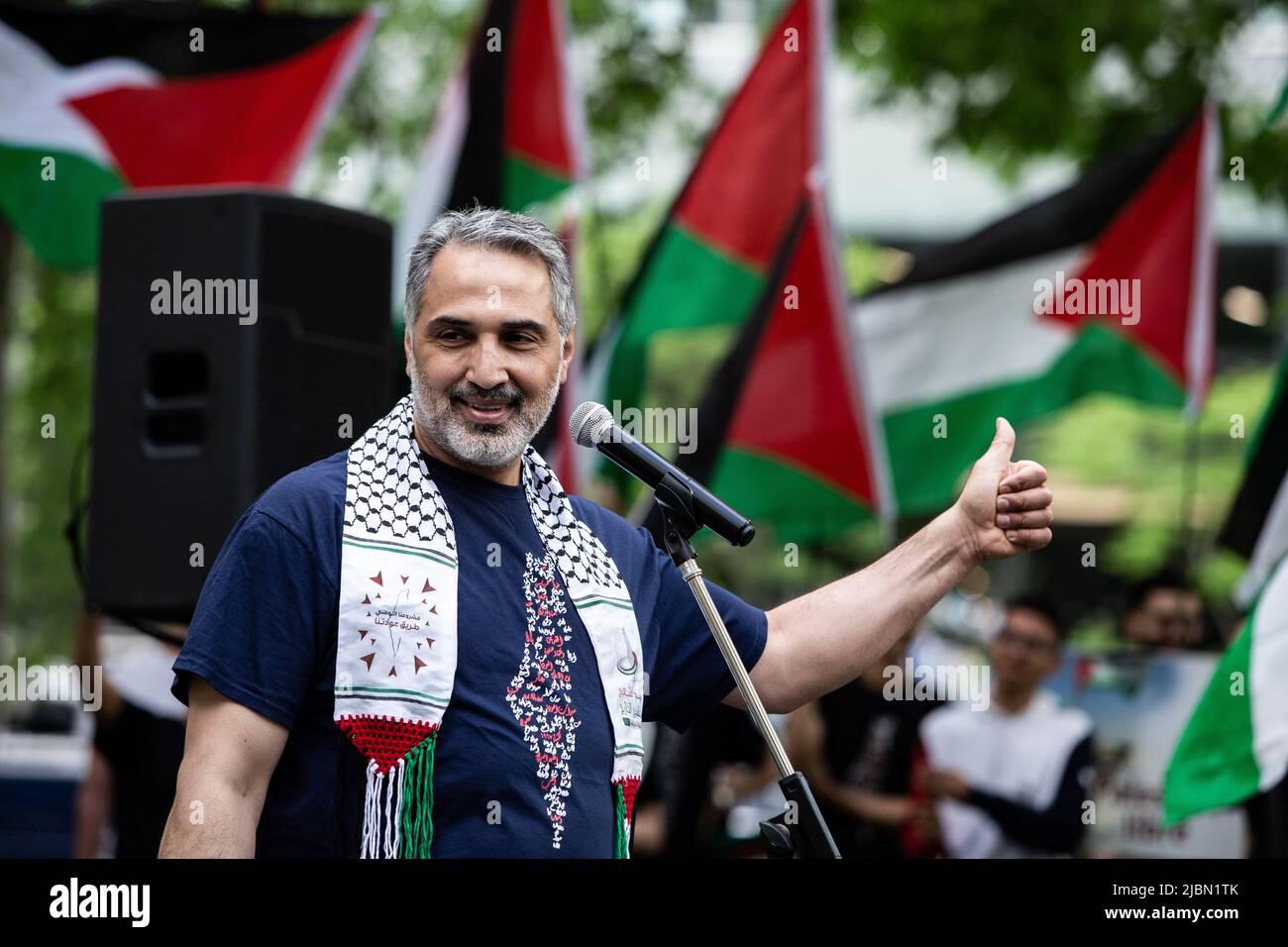 Iyad Abuhamed, event organiser, speaks during the protest Stock Photo ...