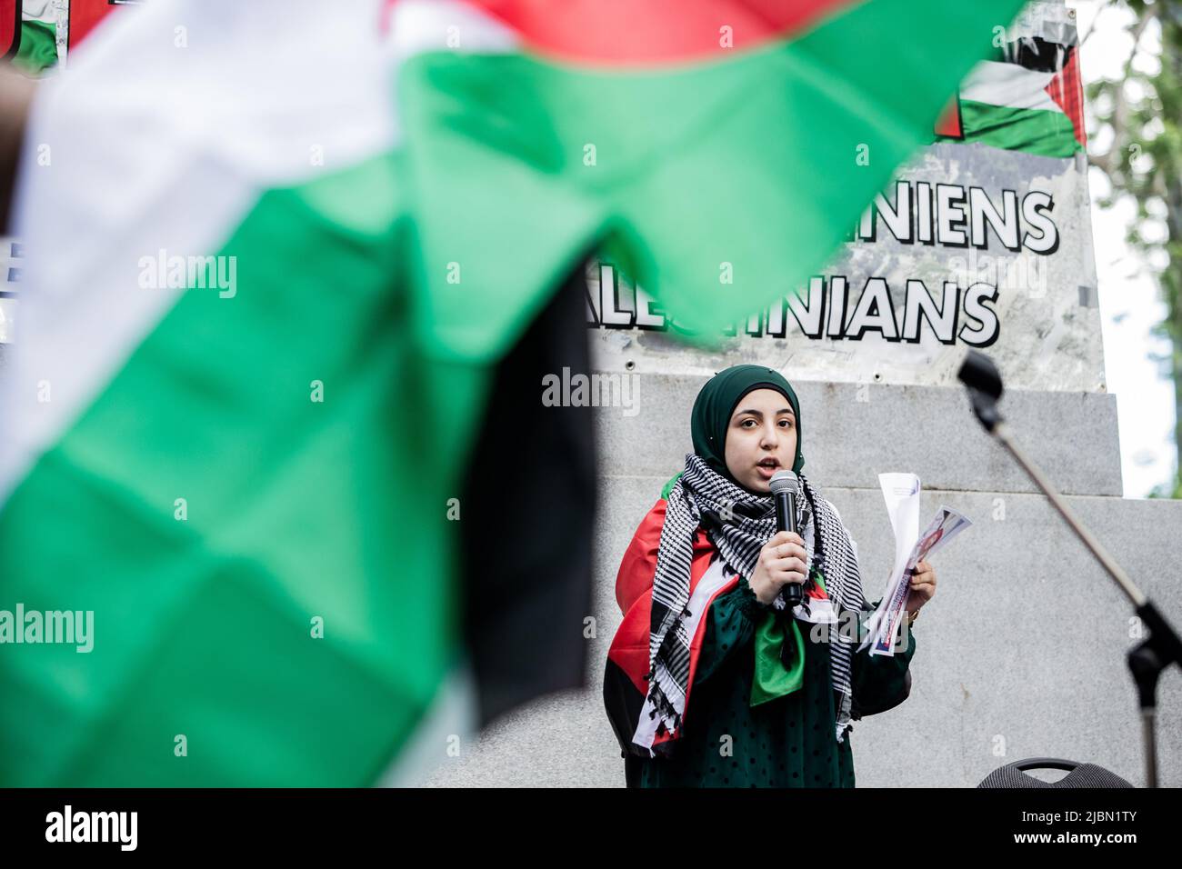 A demonstrator speaks during the protest Stock Photo - Alamy