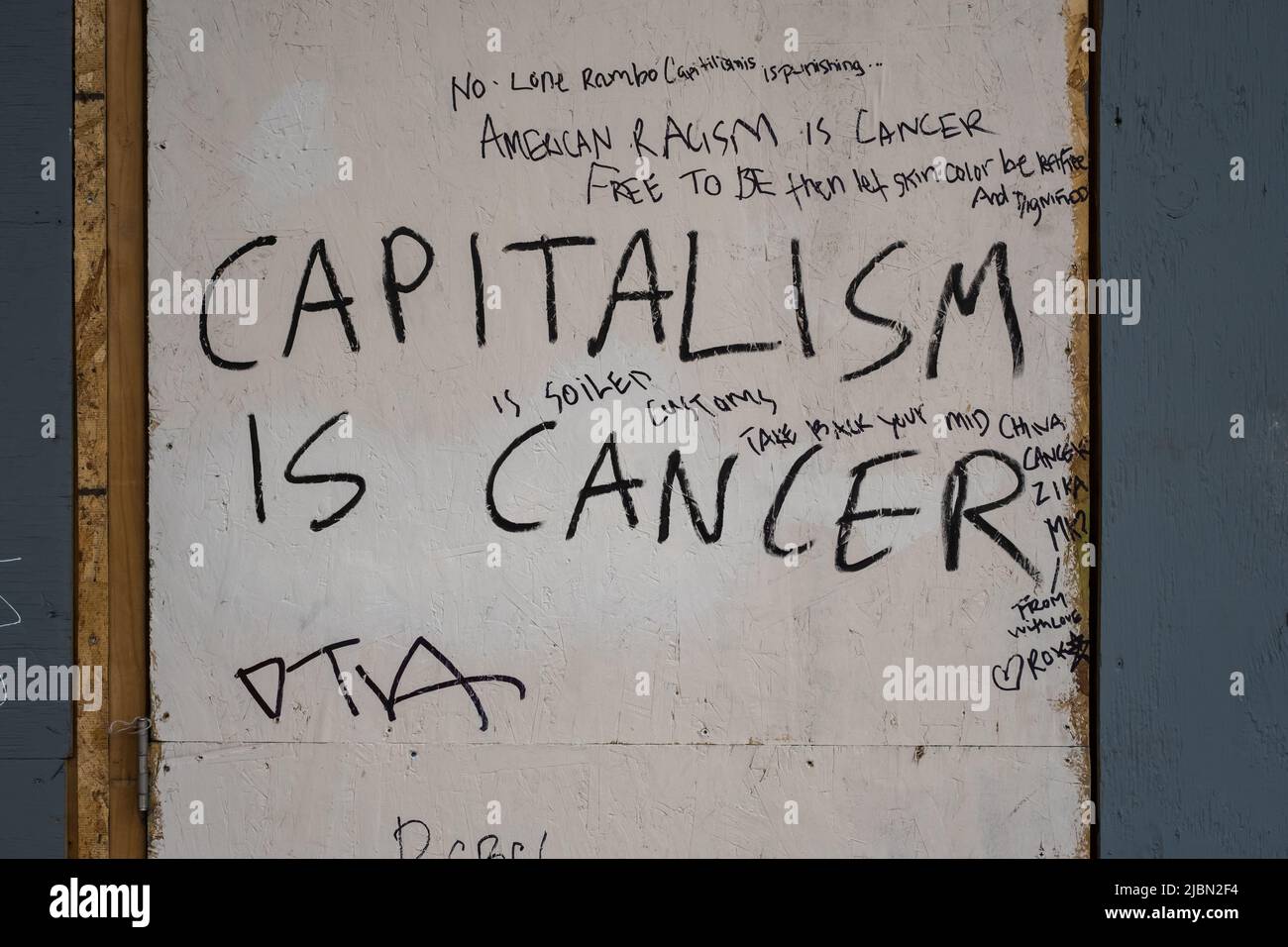 Capitalism is cancer hi-res stock photography and images - Alamy