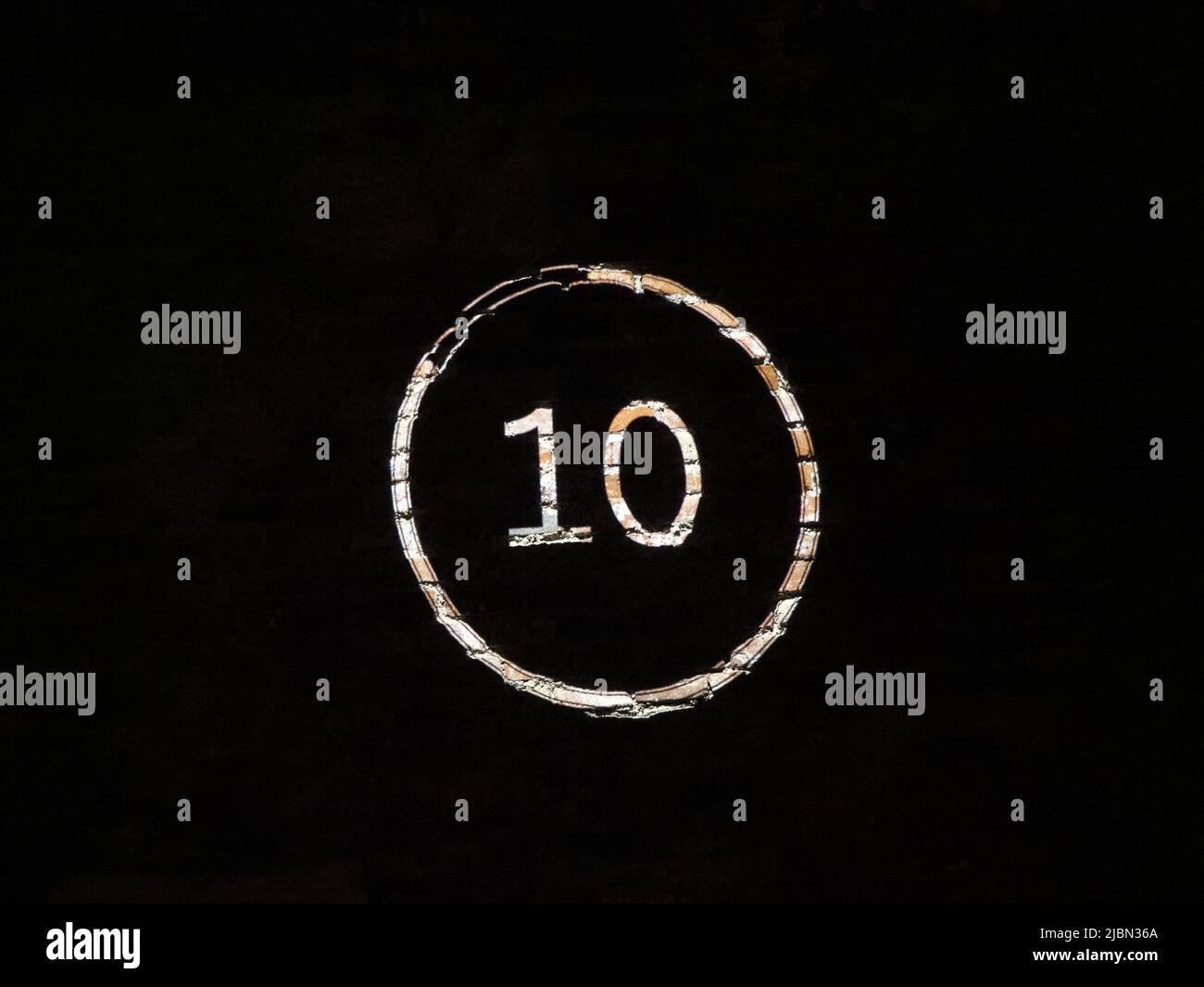 projected number 10 on wall black Stock Photo - Alamy