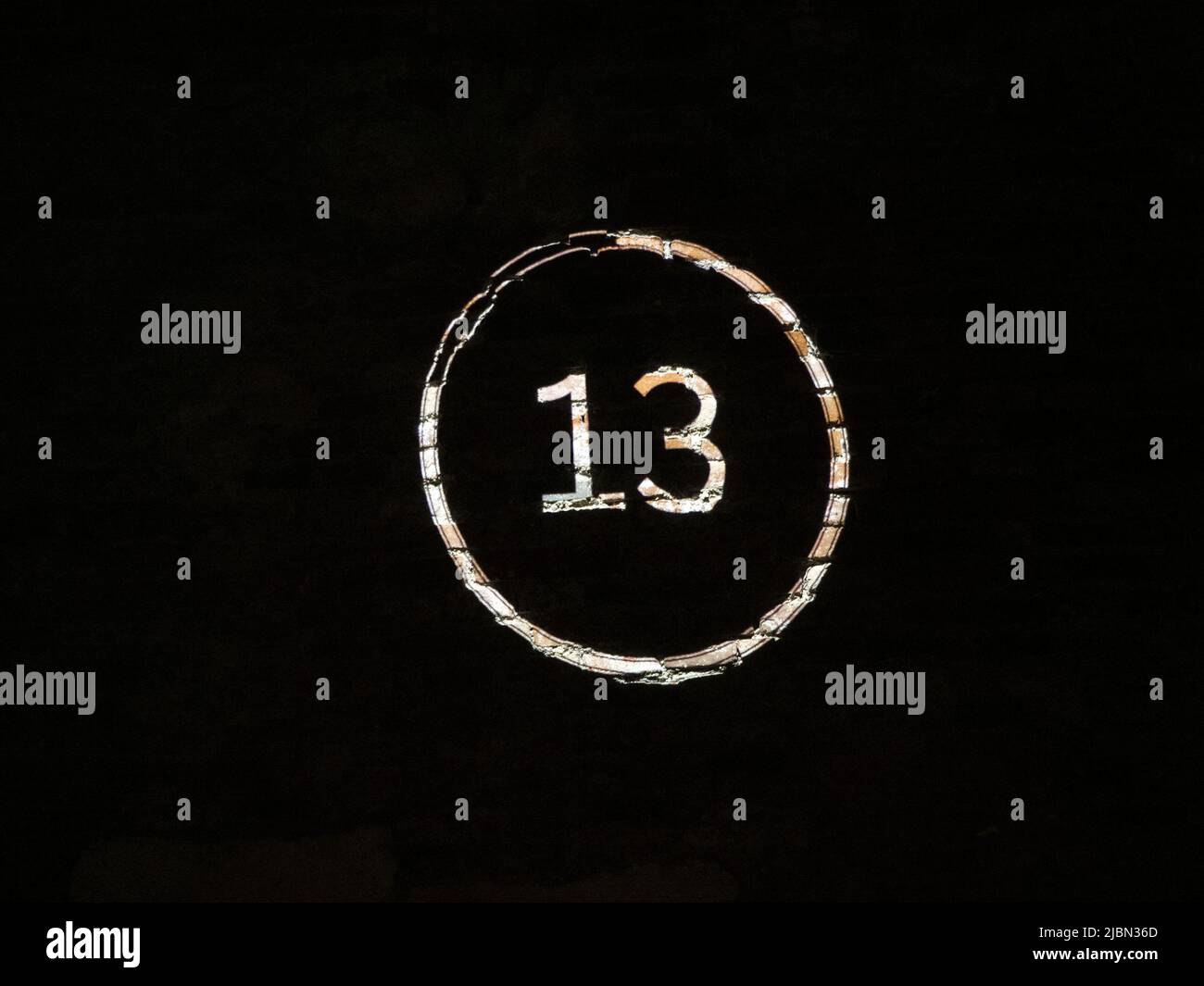 projected number 13 on wall black Stock Photo - Alamy