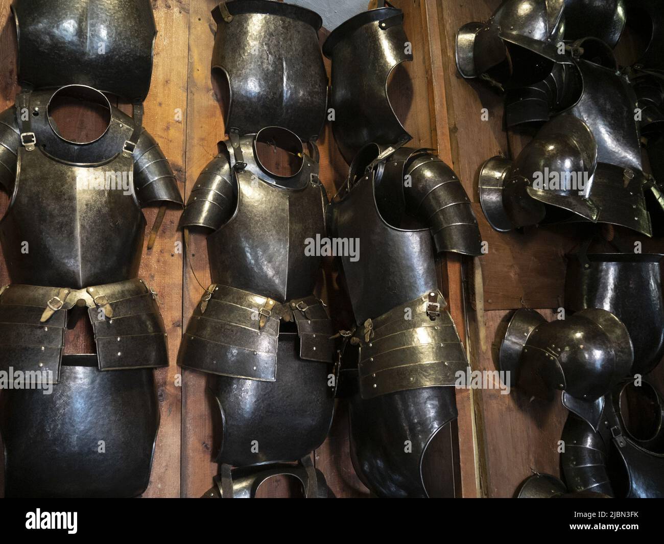 many medieval iron metal armors detail Stock Photo - Alamy