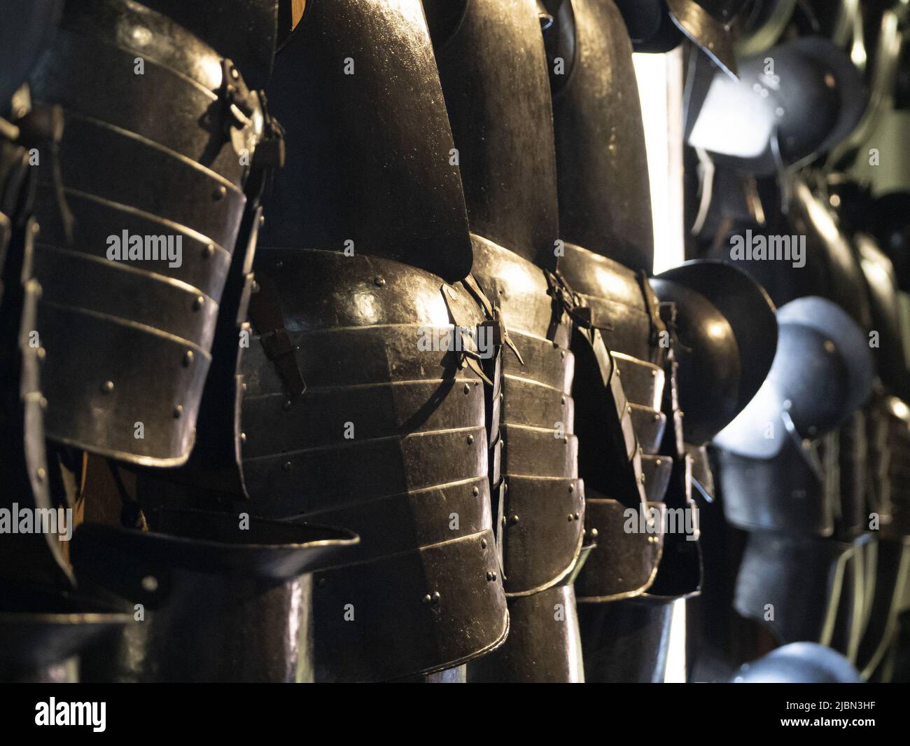 many medieval iron metal armors detail Stock Photo - Alamy