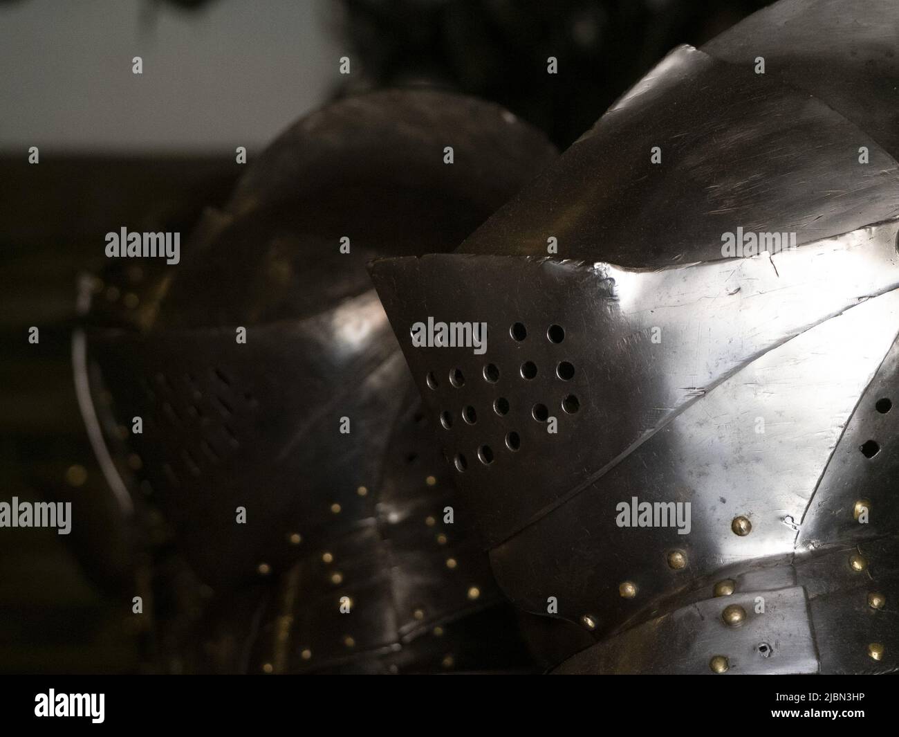 many medieval iron metal helm detail Stock Photo - Alamy