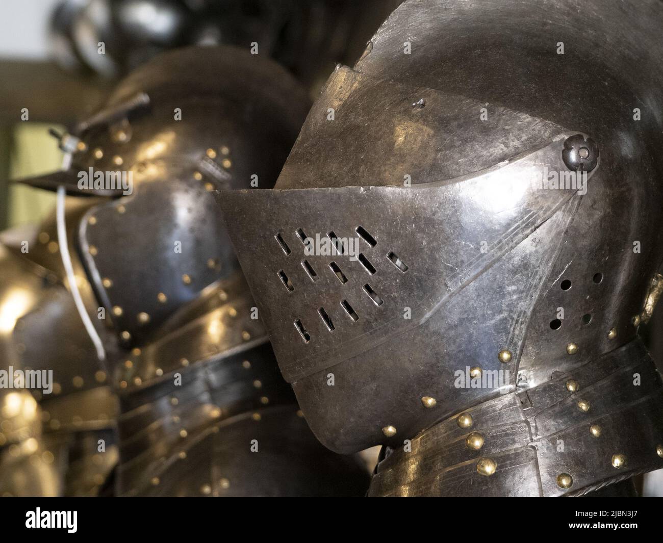many medieval iron metal helm detail Stock Photo - Alamy