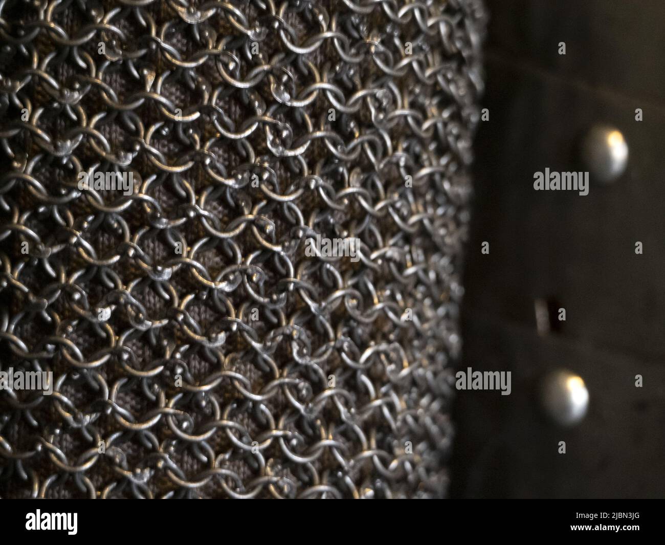 many medieval chain iron metal armors detail Stock Photo - Alamy