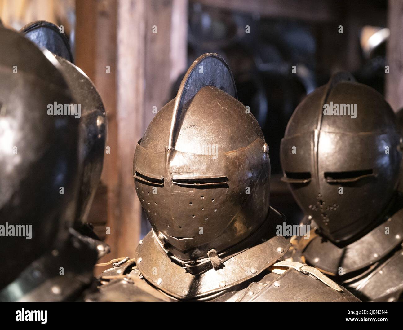 many medieval iron metal armors detail Stock Photo - Alamy