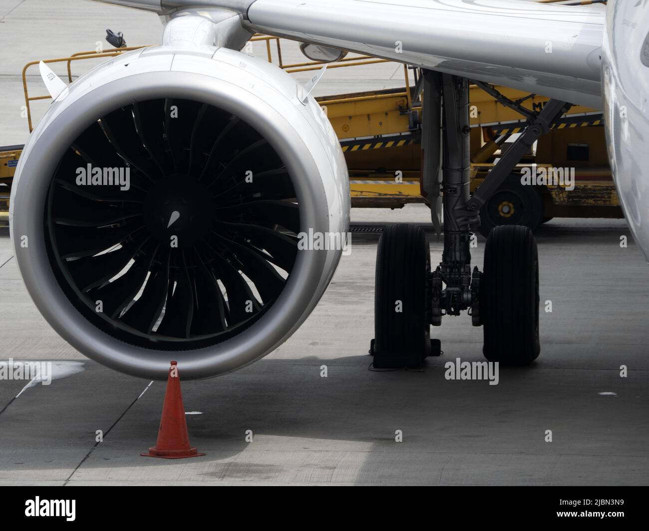 Airplane at the gate preparing to take off detail Stock Photo - Alamy