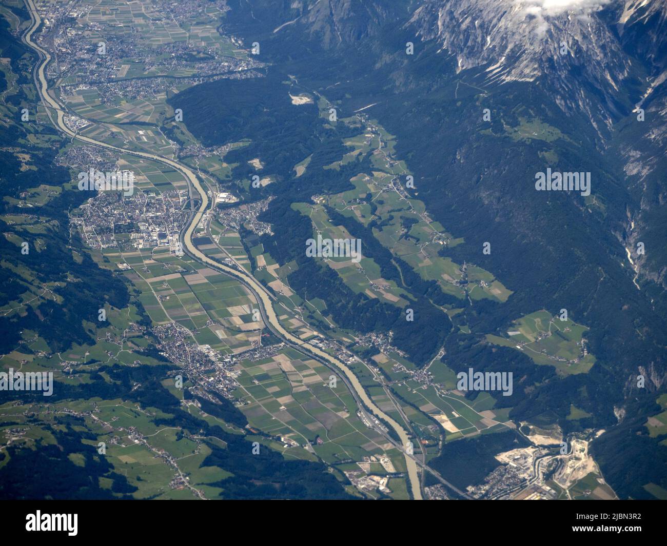 Innsbruck valley aerial panorama from airplane landscape Stock Photo ...