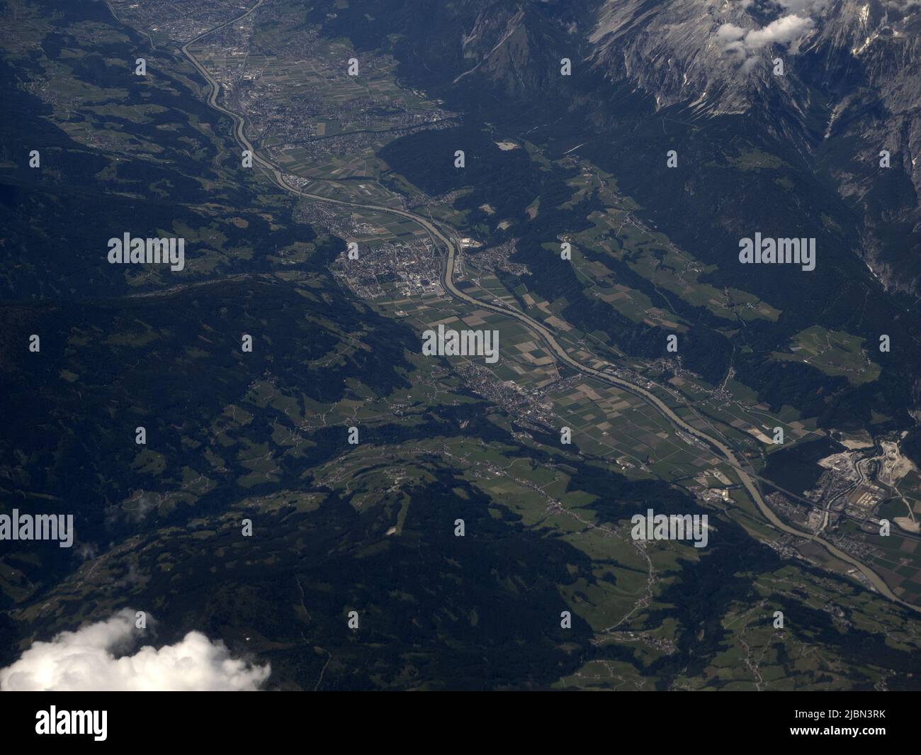 Innsbruck valley aerial panorama from airplane landscape Stock Photo ...