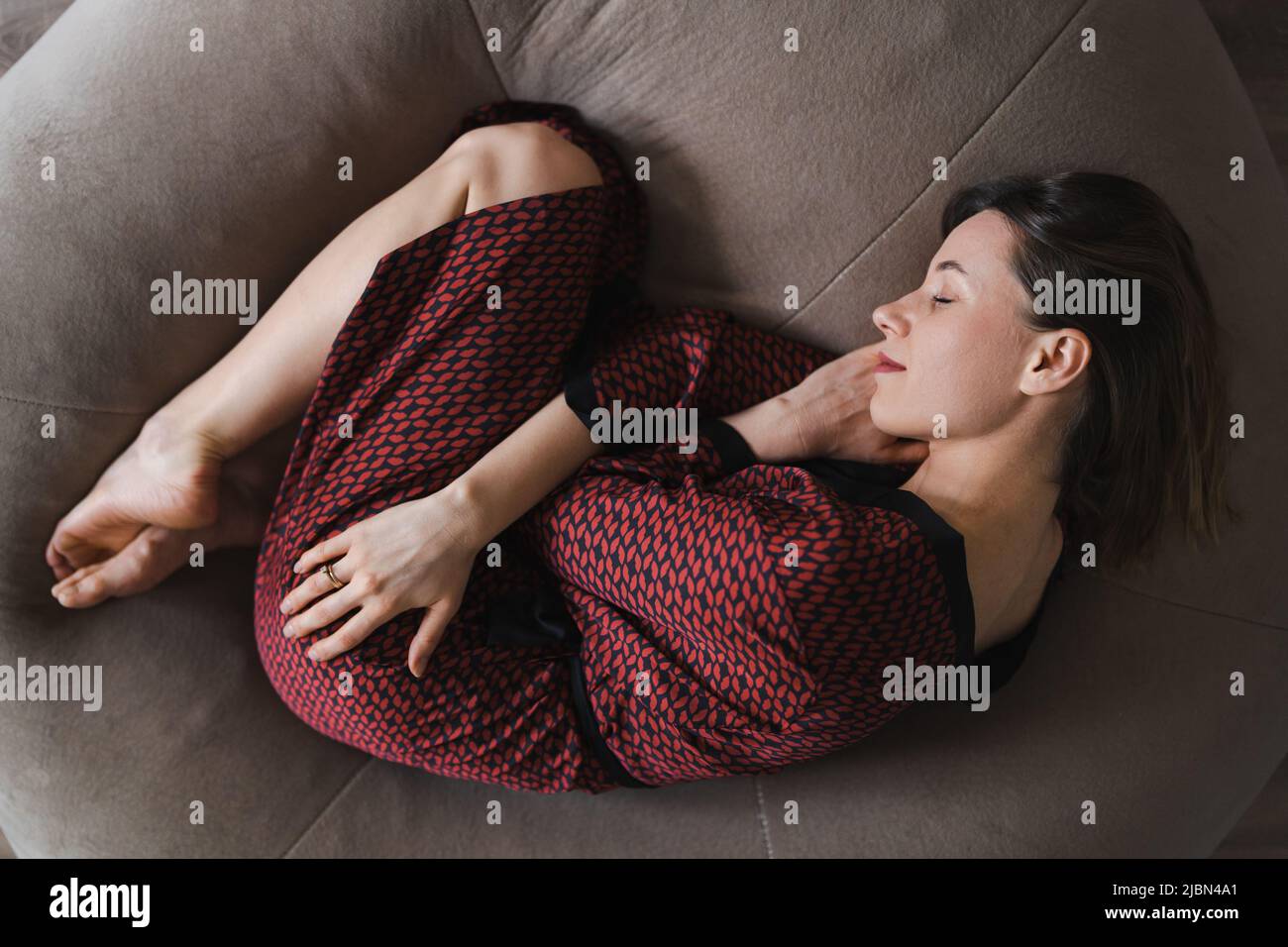 Calm serene beautiful young lady, lying down in a dream, relaxing sleep ...