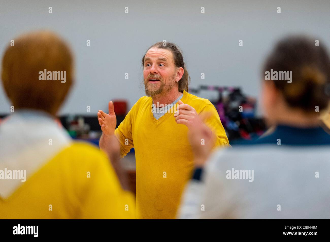 London, UK. 7 June 2022. Music leader Algy Behrens (C) instructs ...