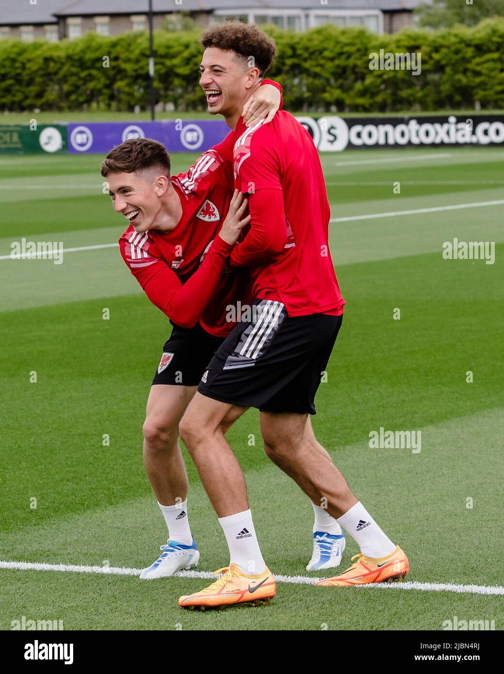 PONTYCLUN, WALES - 07 JUNE 2022: Wales' Harry Wilson and Wales' Ethan ...
