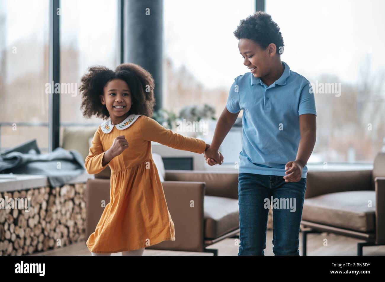 Boy dancing in room hi-res stock photography and images - Alamy