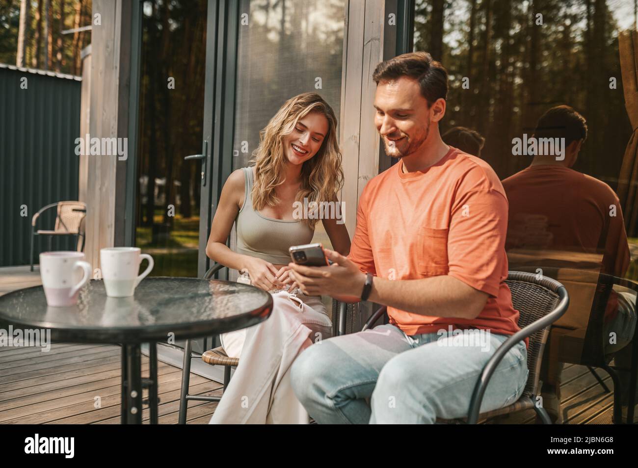 Woman showing something boyfriend hi-res stock photography and images ...