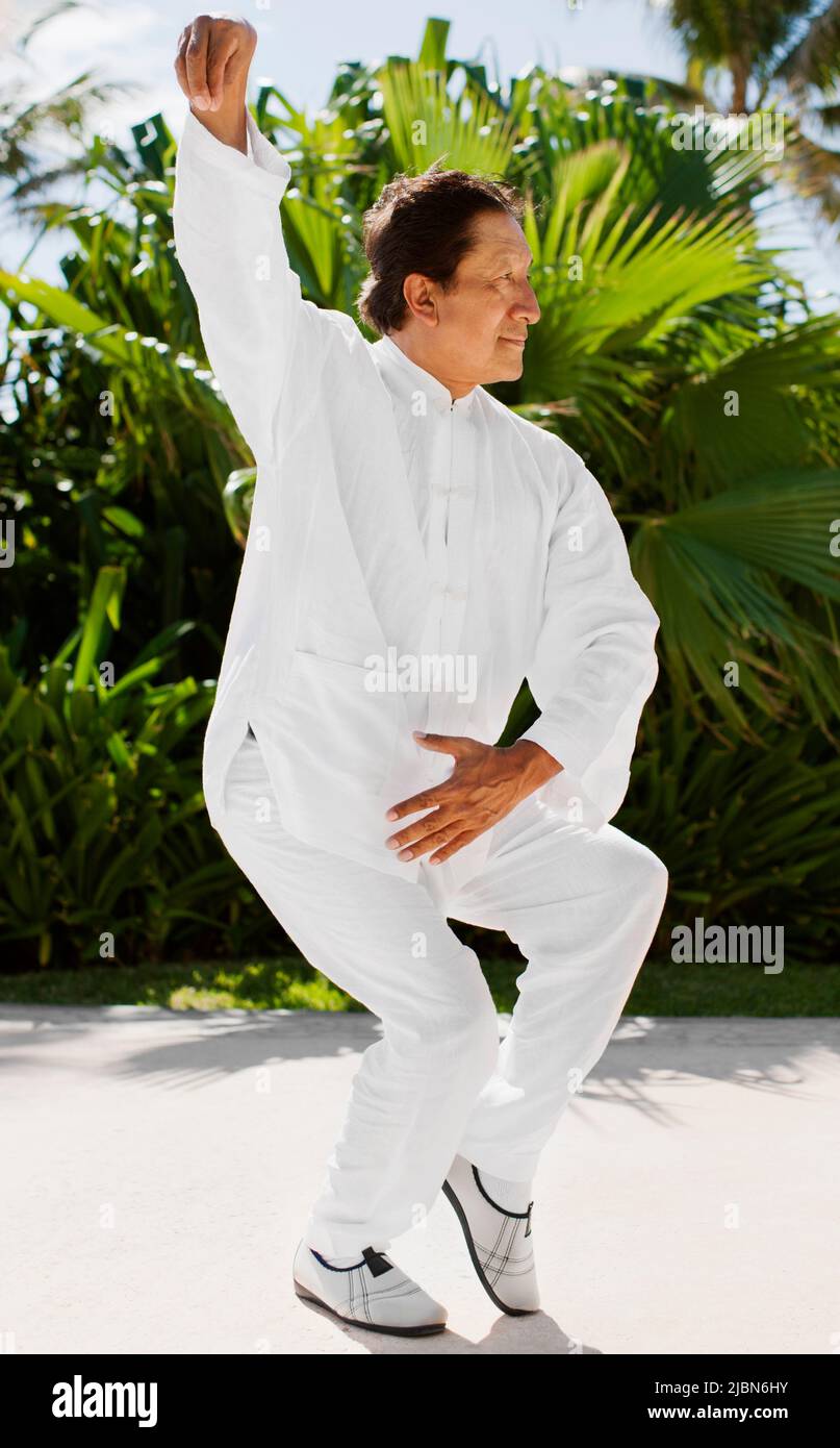 Victor, a tai chi instructor, calls on Billy the parrot, as part of the ...