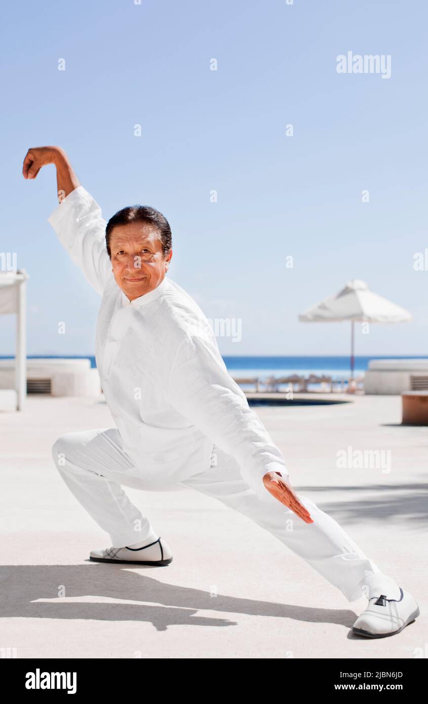 Victor, a tai chi instructor, calls on Billy the parrot, as part of the ...