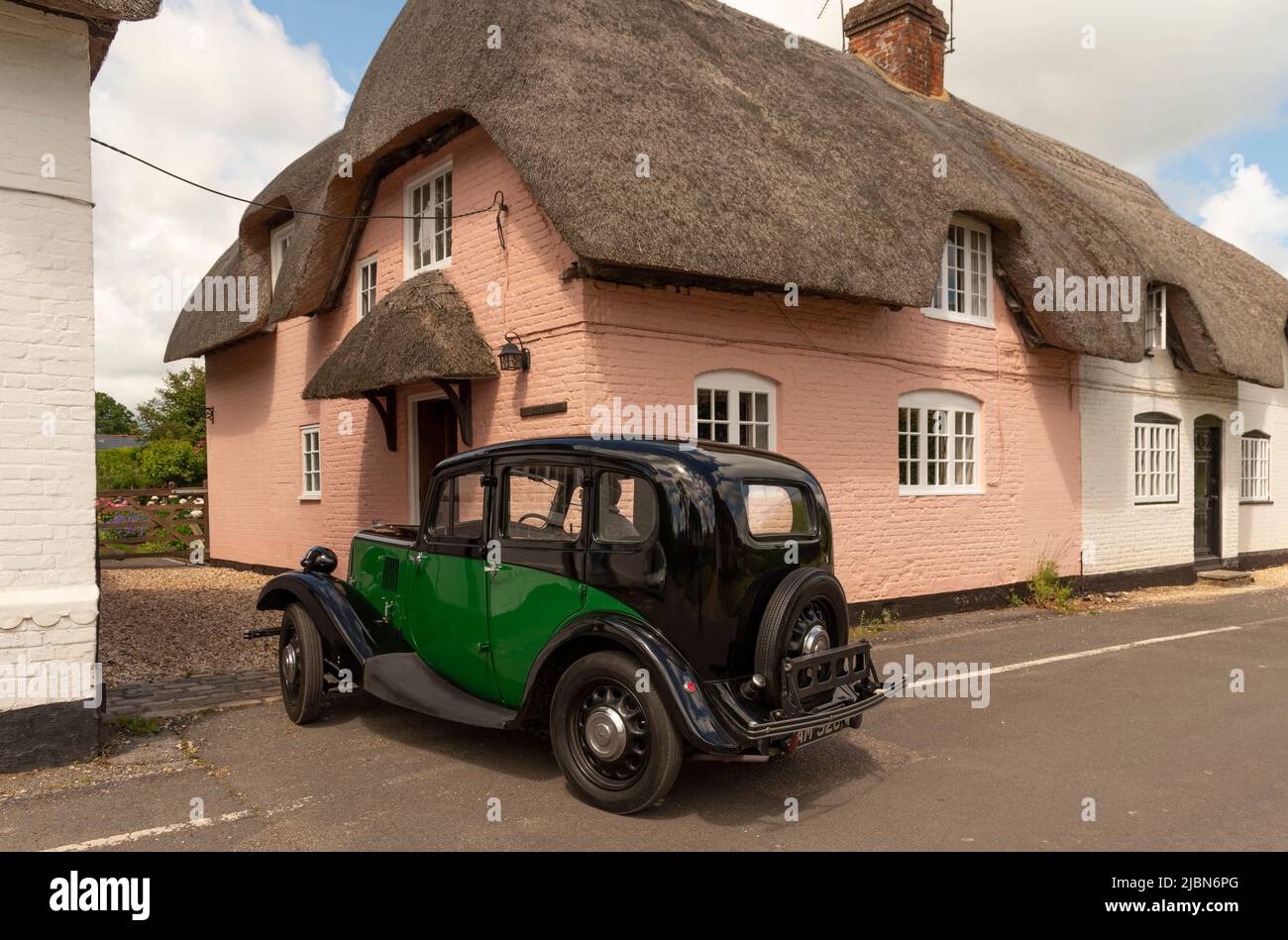 Car turning into side street hi-res stock photography and images - Alamy