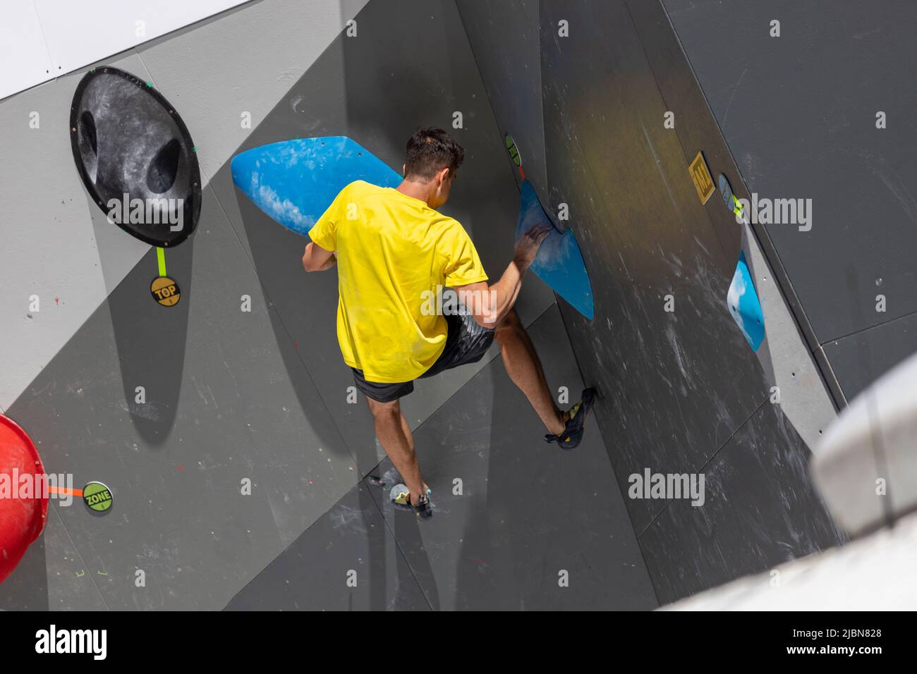 Climbing. Sport. Young person climbing in Block Climbing. Olympic ...